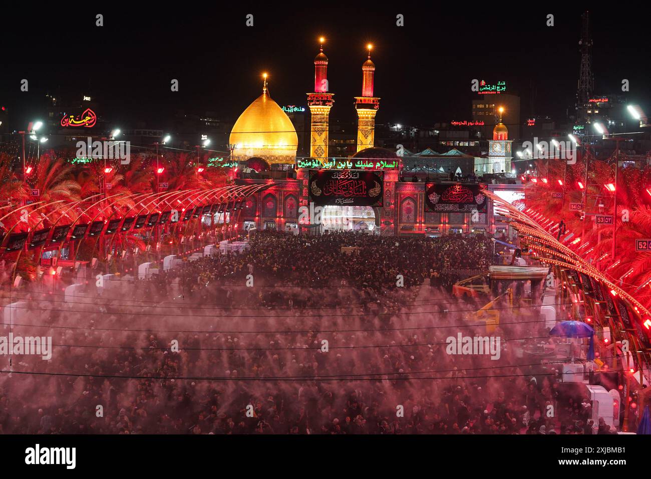 Shiite Muslims take part in the mourning rituals during a religious ...