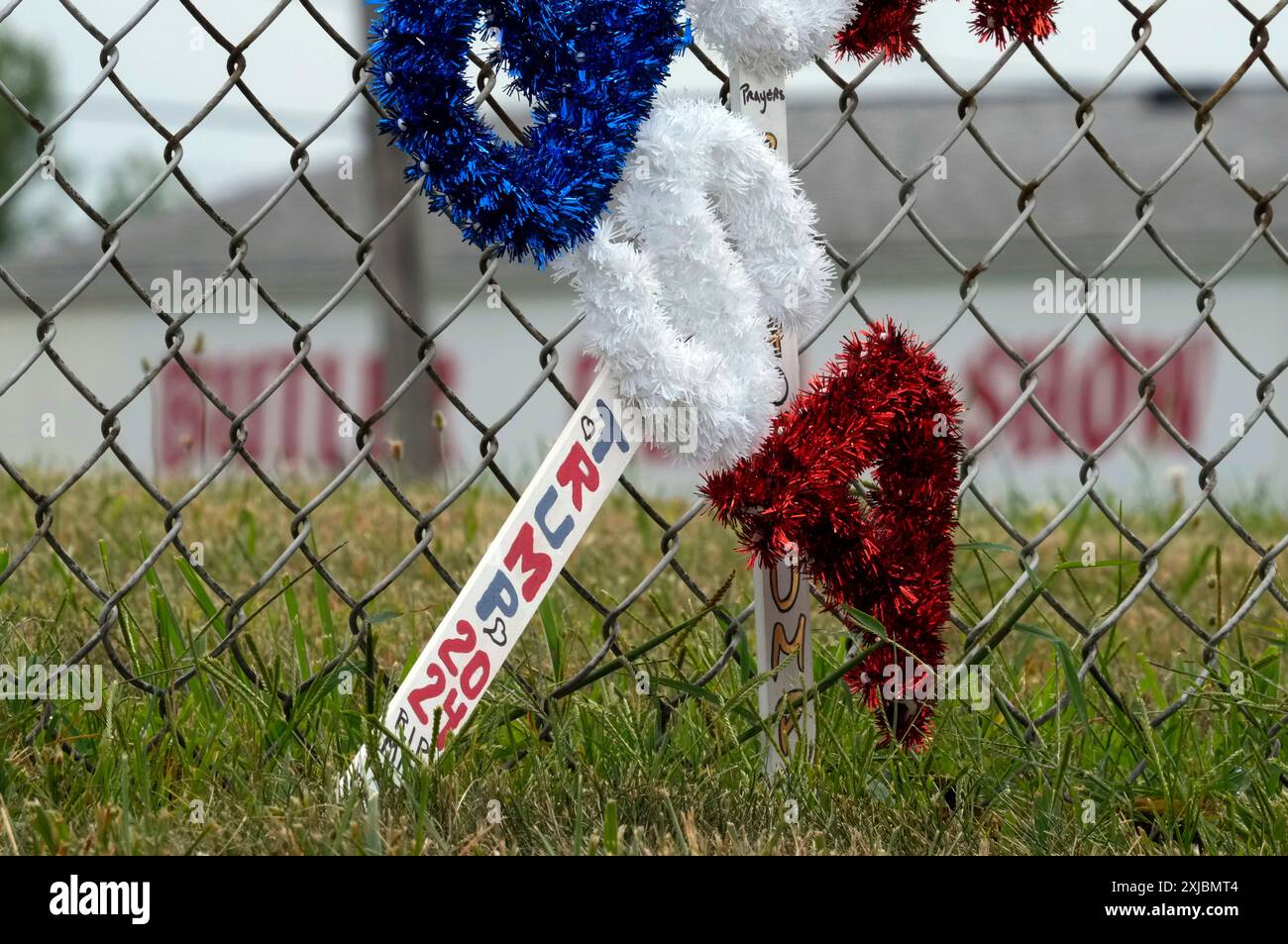 A memorial rest along a fence outside the Butler Farm Show in Butler ...