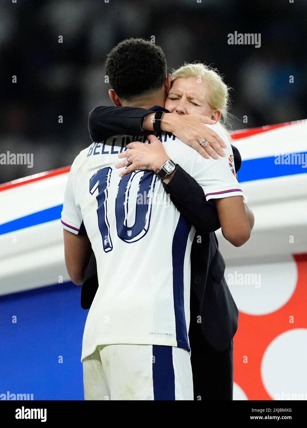 England's Jude Bellingham is embraced by FA Chairperson Debbie Hewitt ...