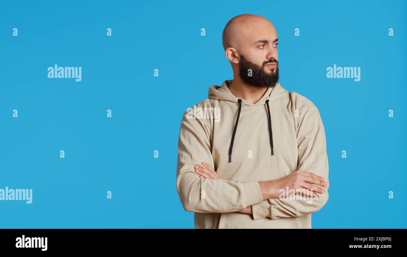 Middle eastern person acting impatient over background, tensed man ...
