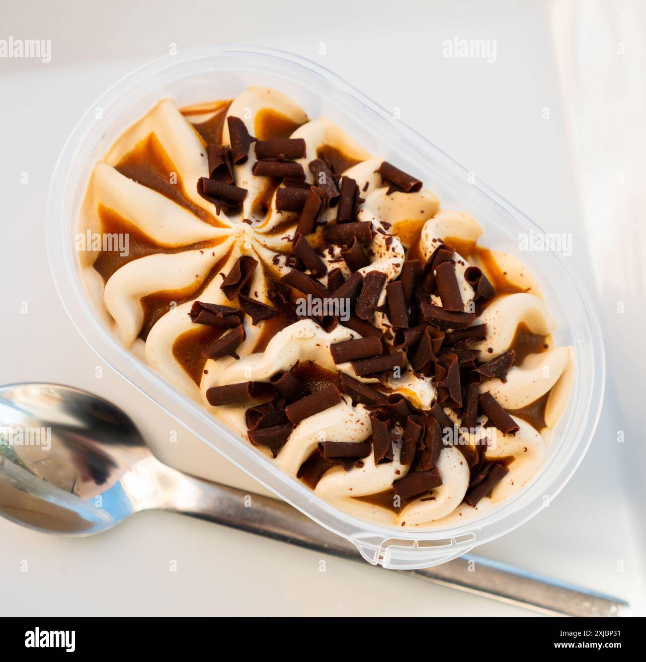 Large portion of ice cream packed in disposable container Stock Photo ...