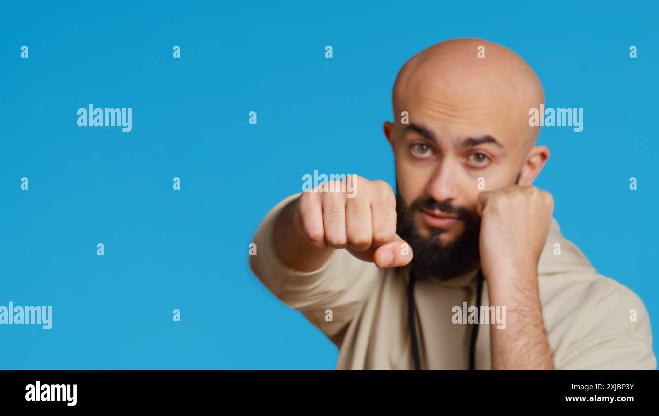 Man punch someone hi-res stock photography and images - Alamy