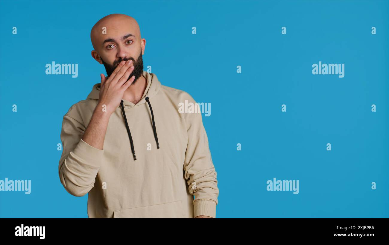 Lovely sweet person blowing air kisses on camera, dping romantic ...