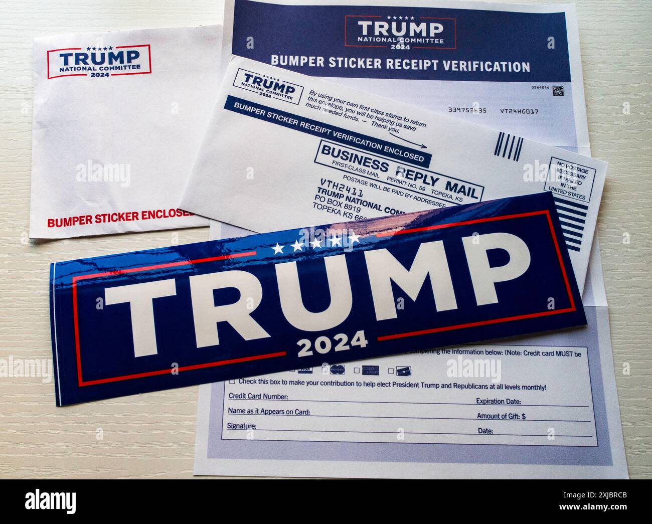 Still life of Donald J. Trump campaign donation mailing with a "Trump ...