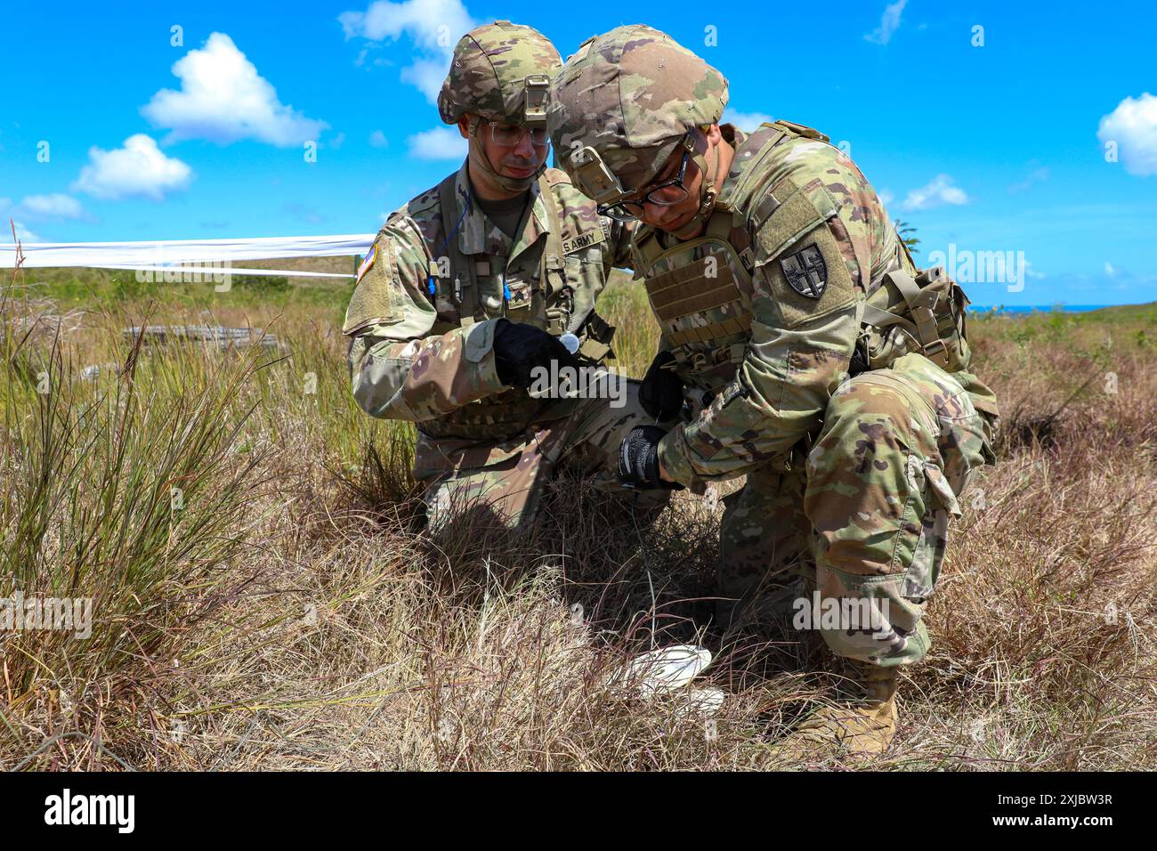U.S. Army Sgt. Héctor Rivera and Spc. Gabriel Rivera, both assigned to ...