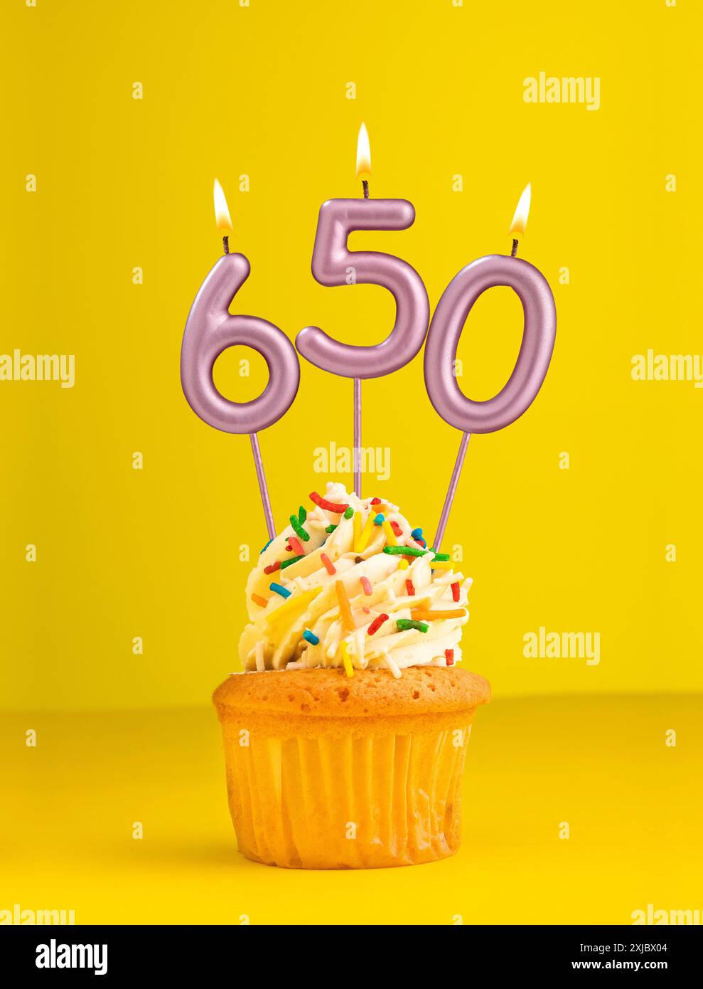 Candle number 650 - Number of followers or likes Stock Photo - Alamy