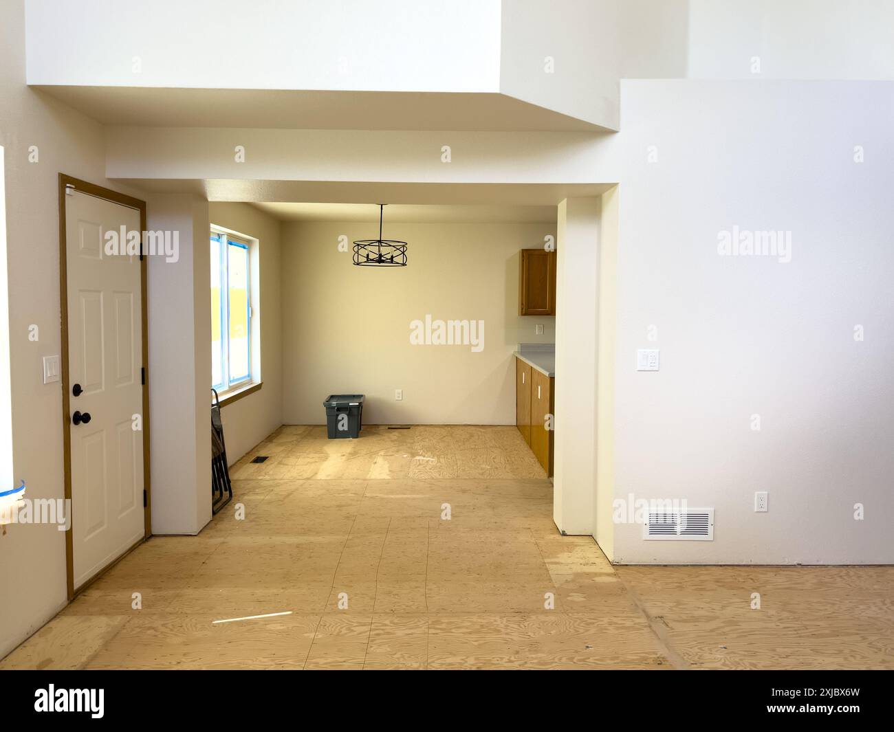 Multi-Level Home Interior Under Renovation with Staircase and Prepped ...