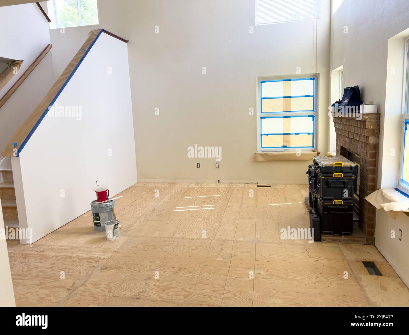 Multi-Level Home Interior Under Renovation with Staircase and Prepped ...
