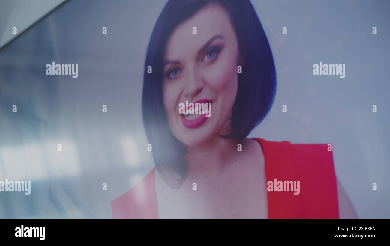 Close up shot of big screen TV monitor with displayed news program ...