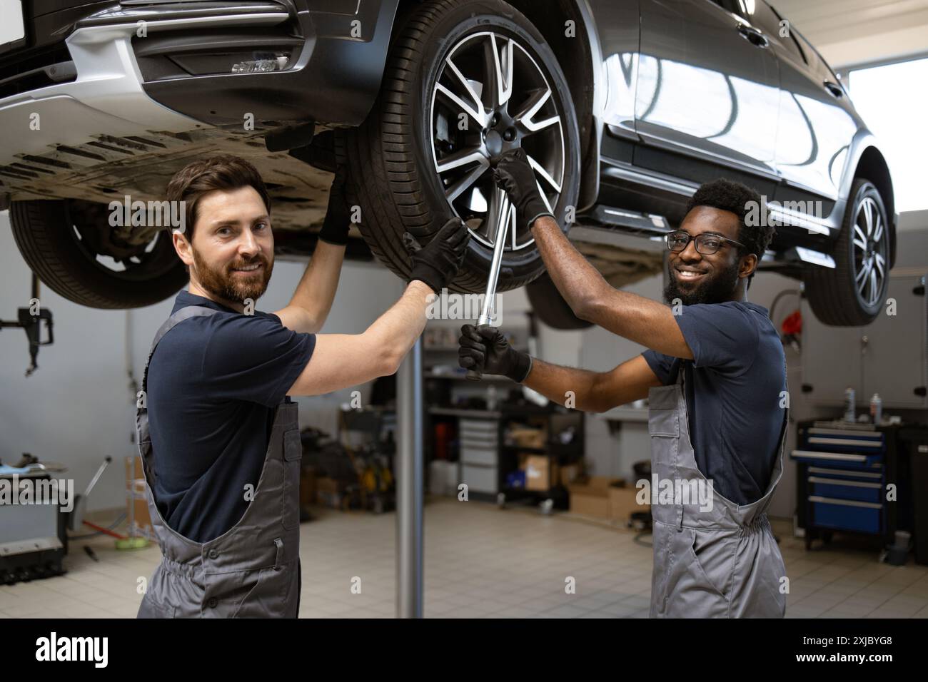 African american caucasian two mechanics hi-res stock photography and ...