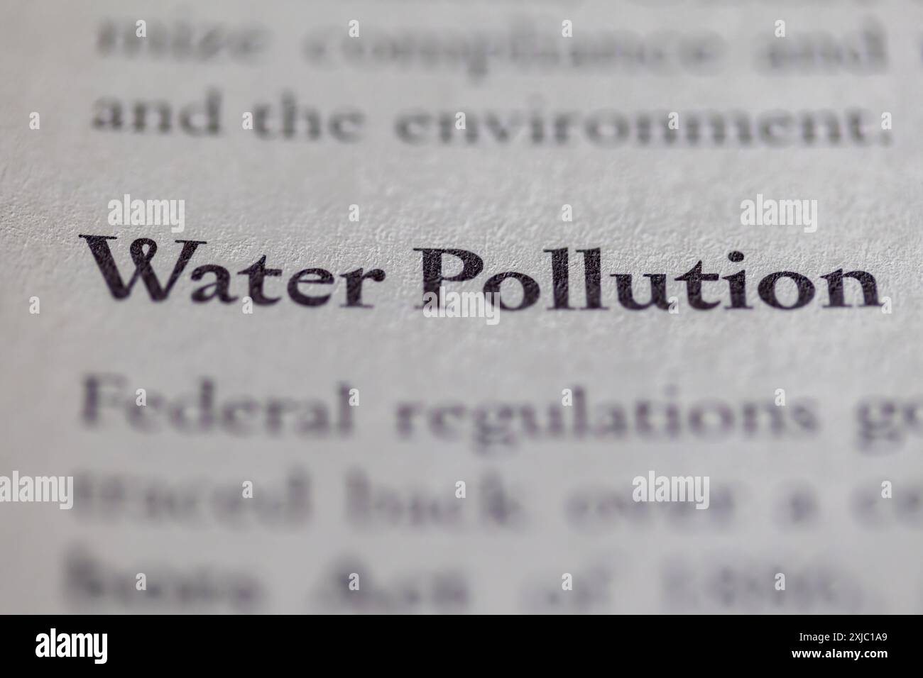Water Pollution printed in text on page as visual aid or business law ...