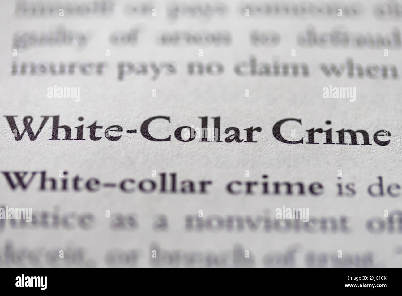 white collar crime printed in text on page as visual aid or business law reference Stock Photo ...