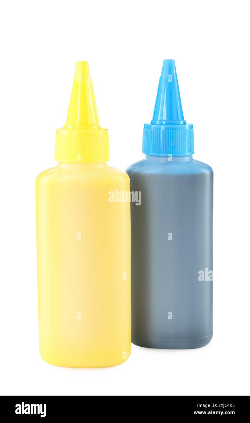 Bottles of different printer ink isolated on white Stock Photo - Alamy