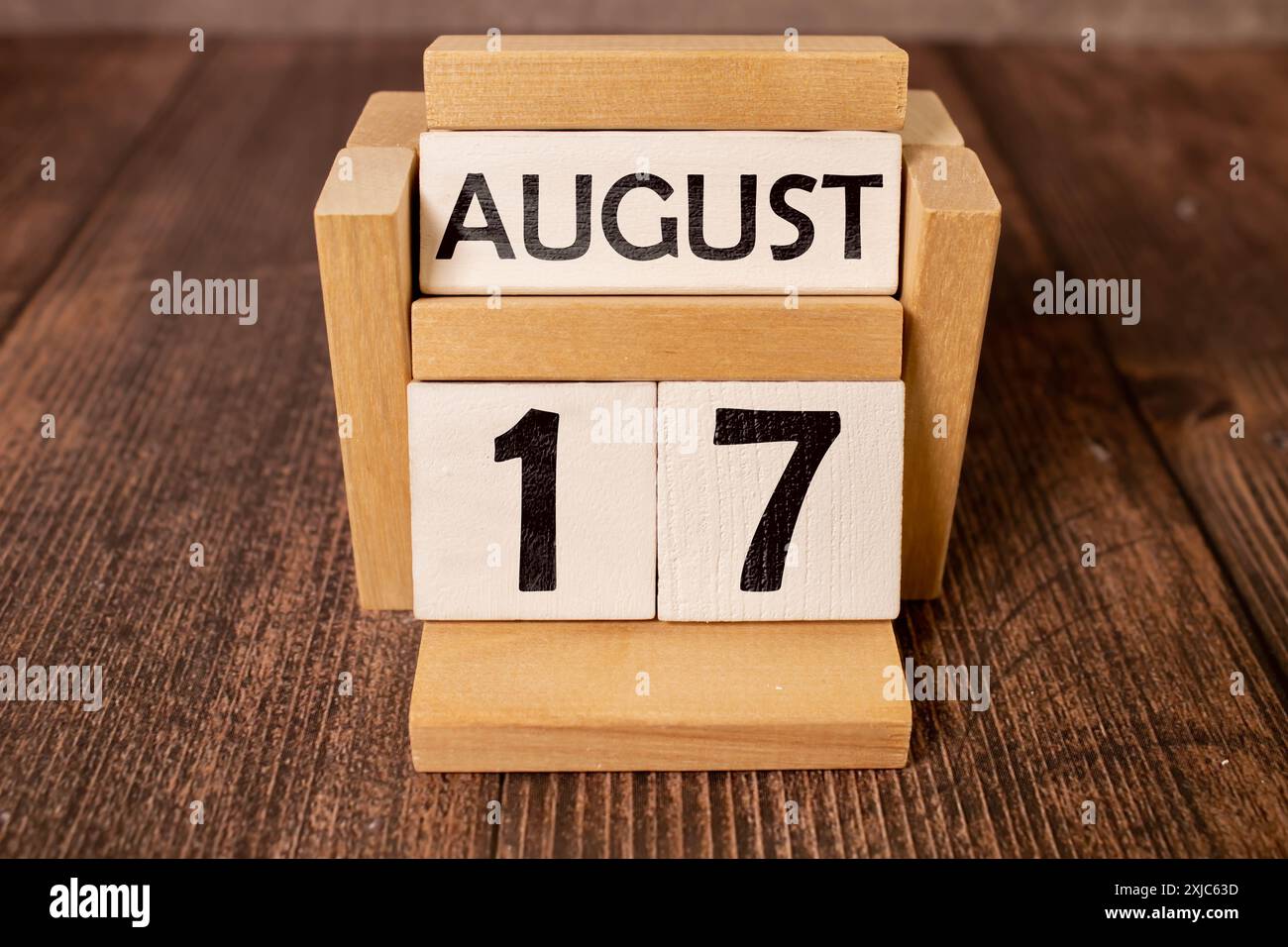 August calendar background with number 17. Stationery pens and pencils ...