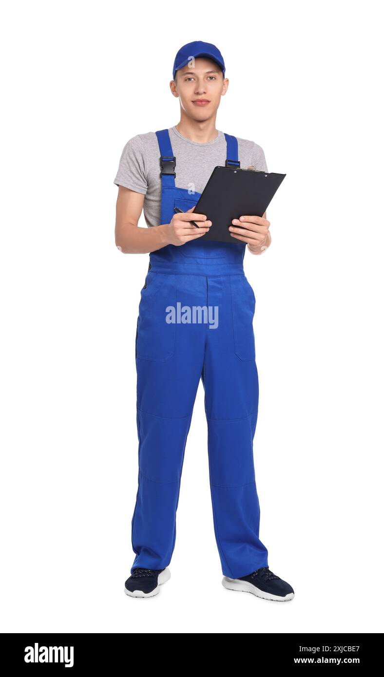 Auto mechanic with clipboard on white background Stock Photo - Alamy