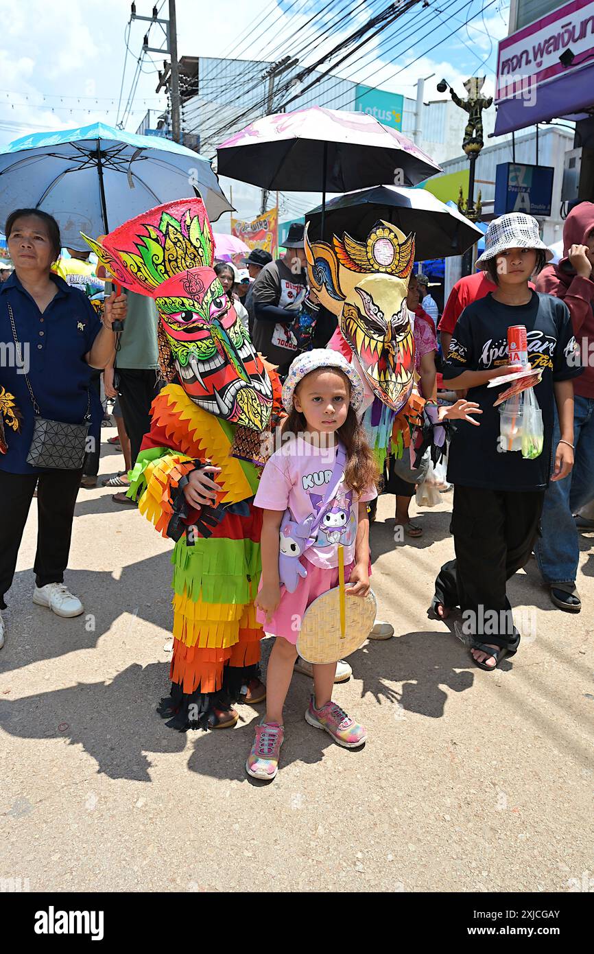 Kids in ghost masks and colorful costumes joining in the fun at the Phi ...