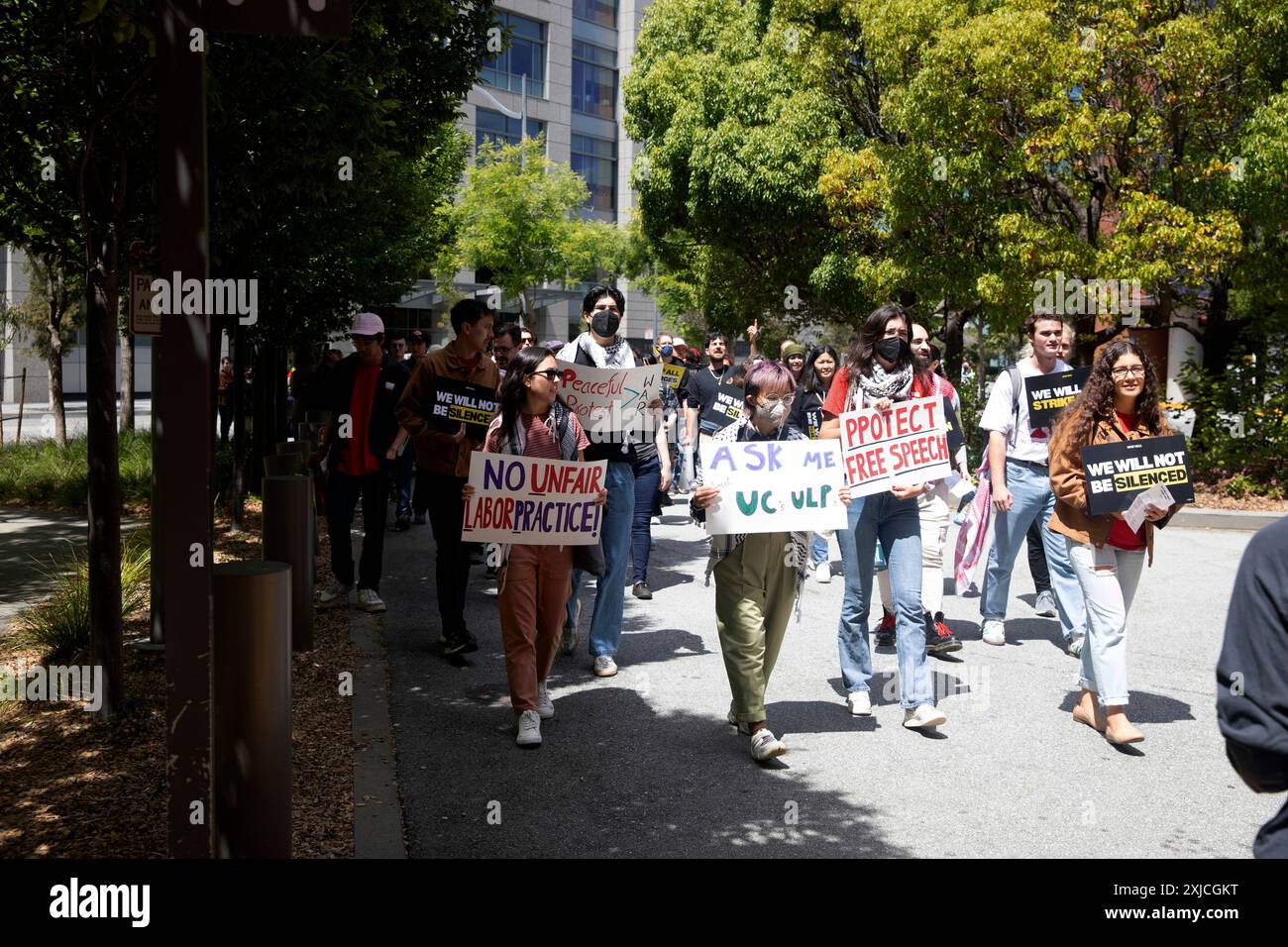 About 60 members of UAW 4811, the union that represents academic ...