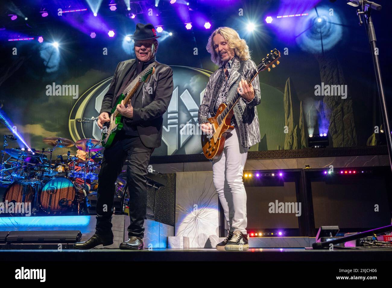 James Young, left, and Tommy Shaw of Styx perform at Ameris Bank ...