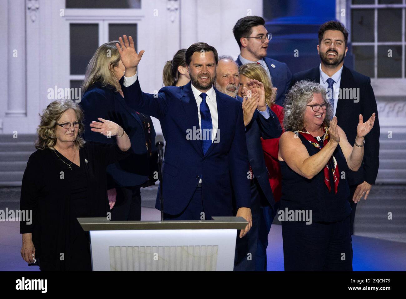 Republican vice presidential nominee JD Vance waves alongside family ...