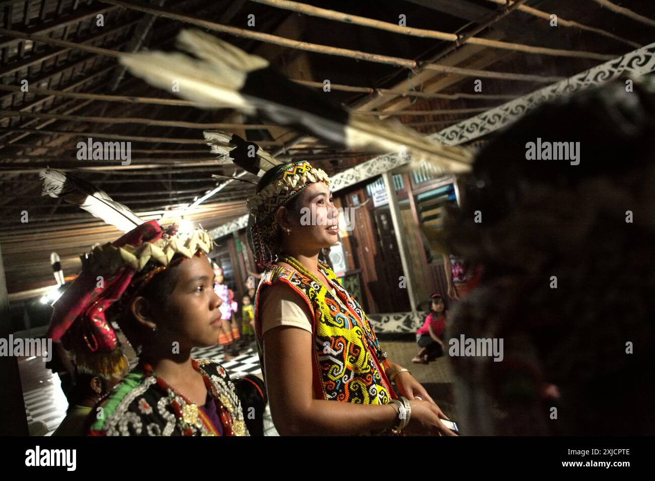 Portrait of young women in traditional attire during an ecotourism ...