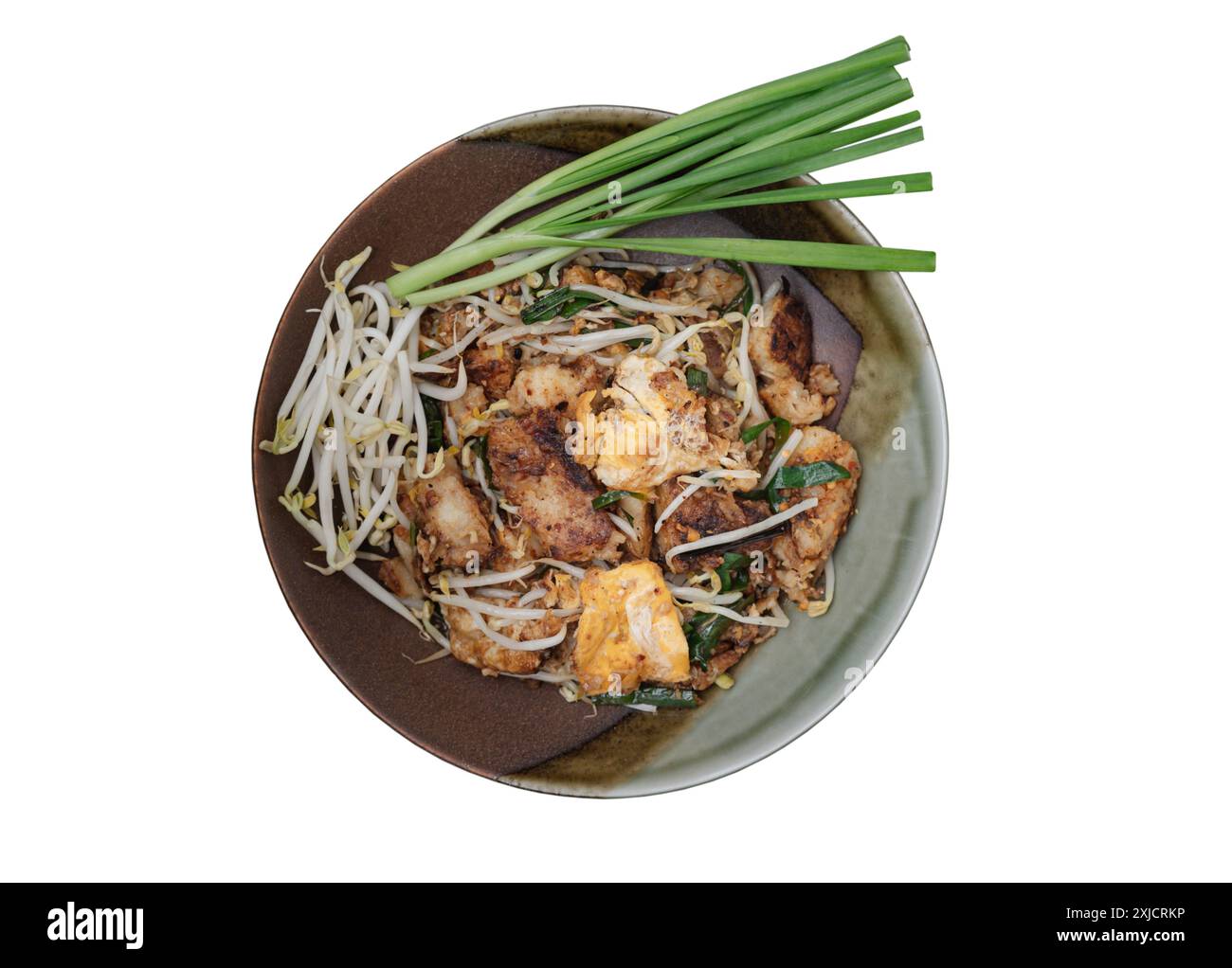 Stir-fried soft turnip cake or Fried radish cake (chai tow kway) with ...