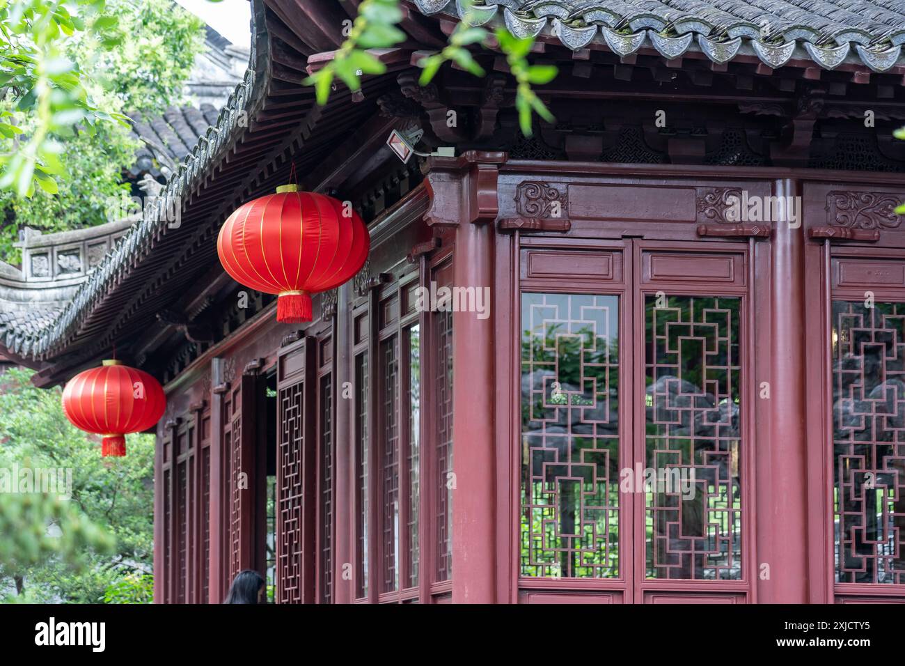 Shanghai, China - June 06, 2024 : A red lantern hangs outside a ...