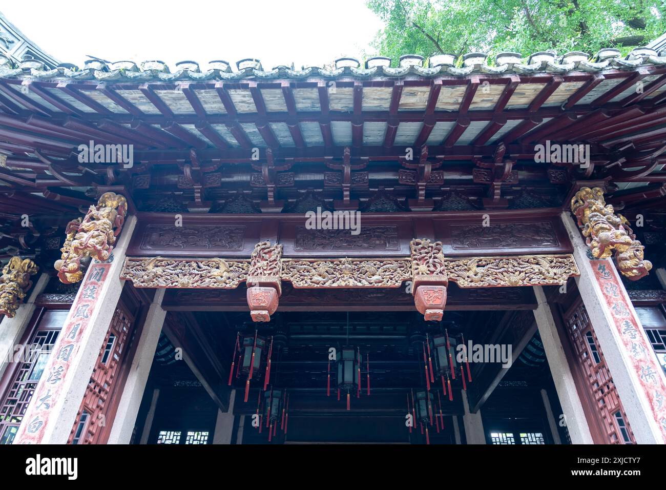 Shanghai, China - June 06, 2024 : Intricate carvings adorn the wooden ...
