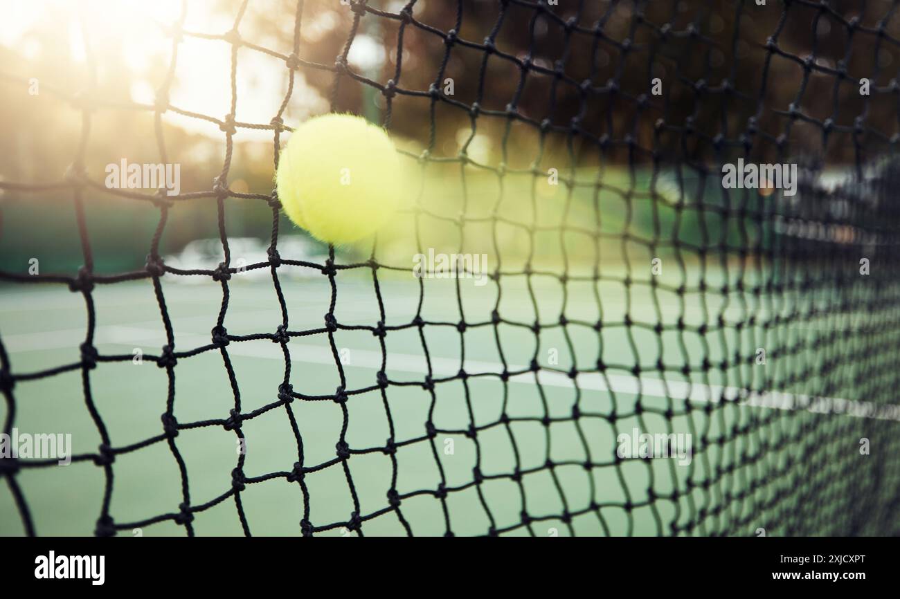 Tennis, court and ball with motion to net for sports match, competition ...