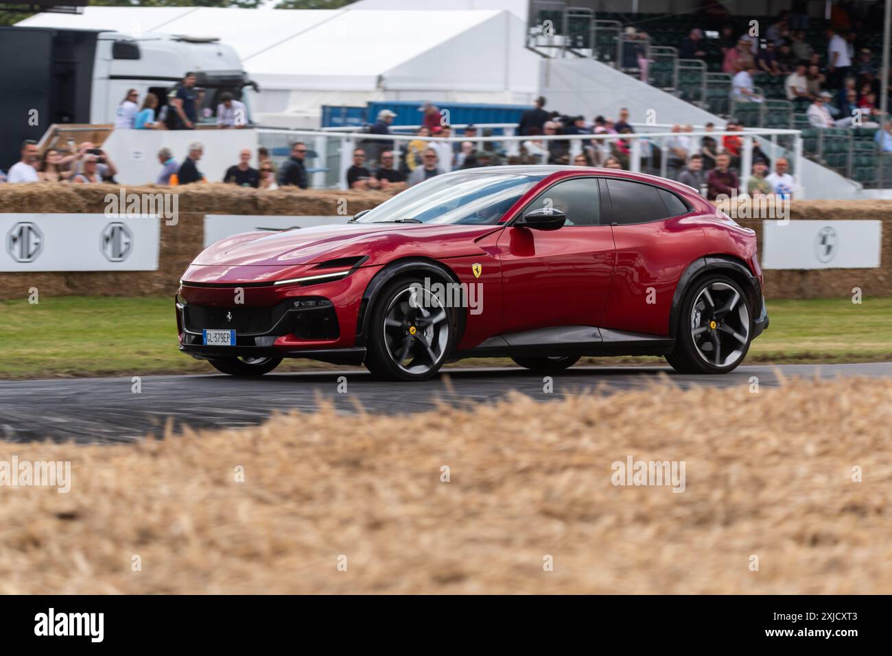 Ferrari Purosangue (Type F175) car driving up the hill climb track at ...