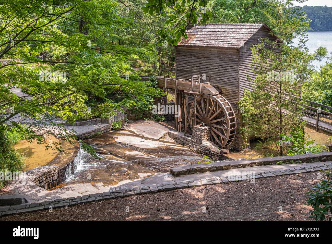 Scenic historic Grist Mill with active overshot waterwheel at Stone ...