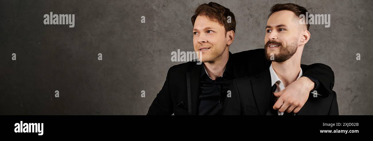 Two men in suits embrace, showing love and affection Stock Photo - Alamy