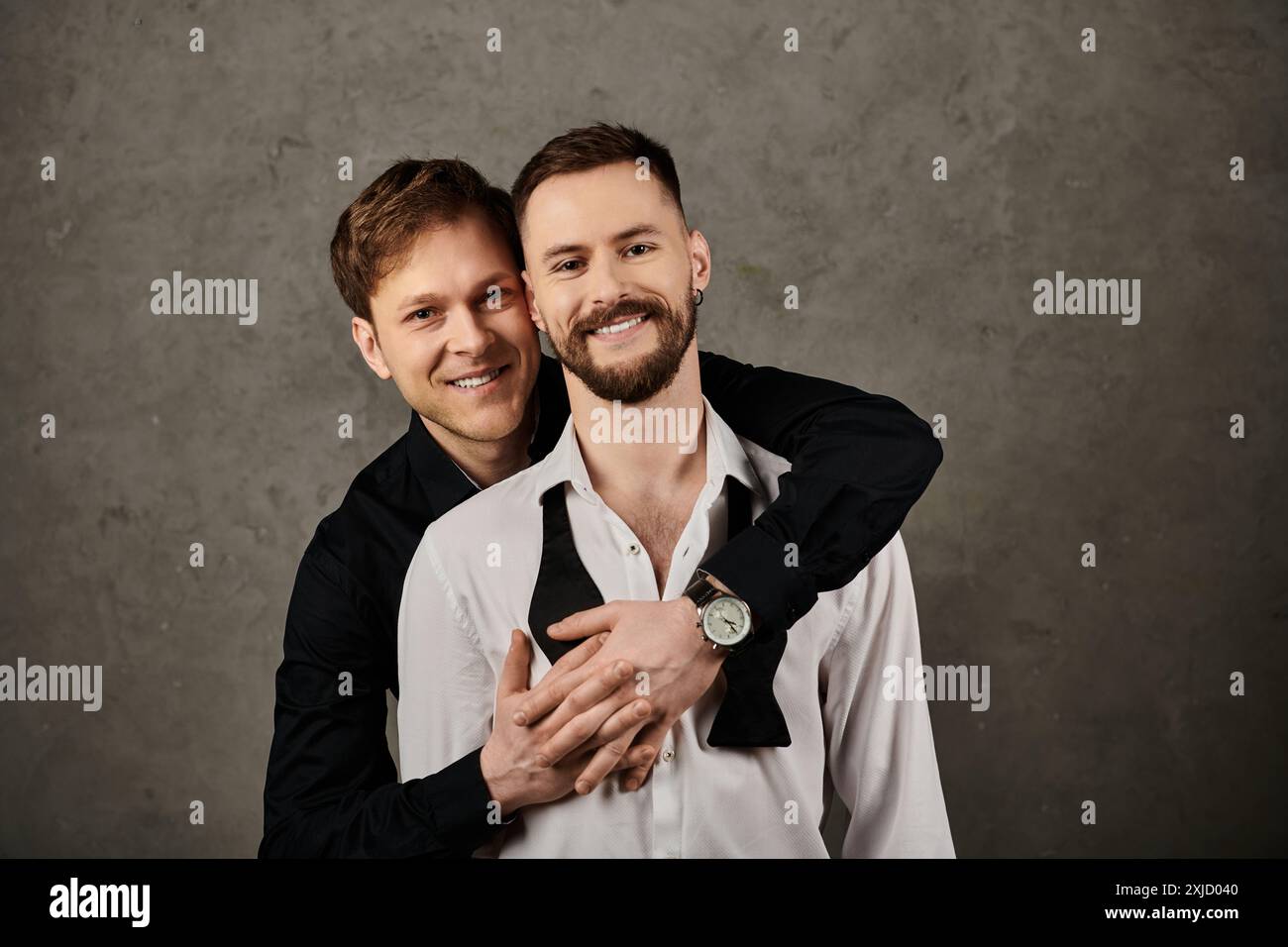 Men in grey suits hi-res stock photography and images - Alamy