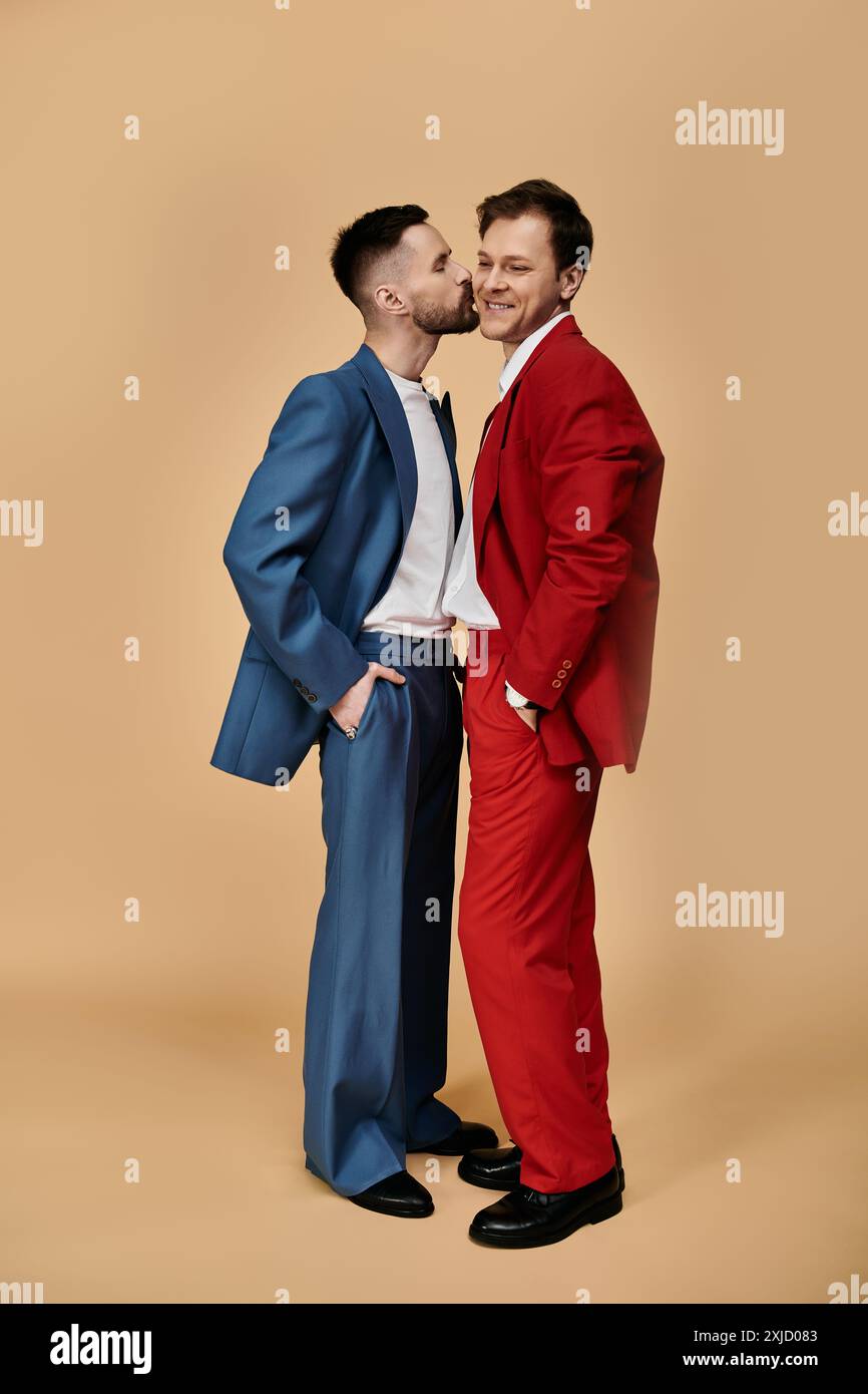 Two men in suits stand close, one kissing the others cheek ...