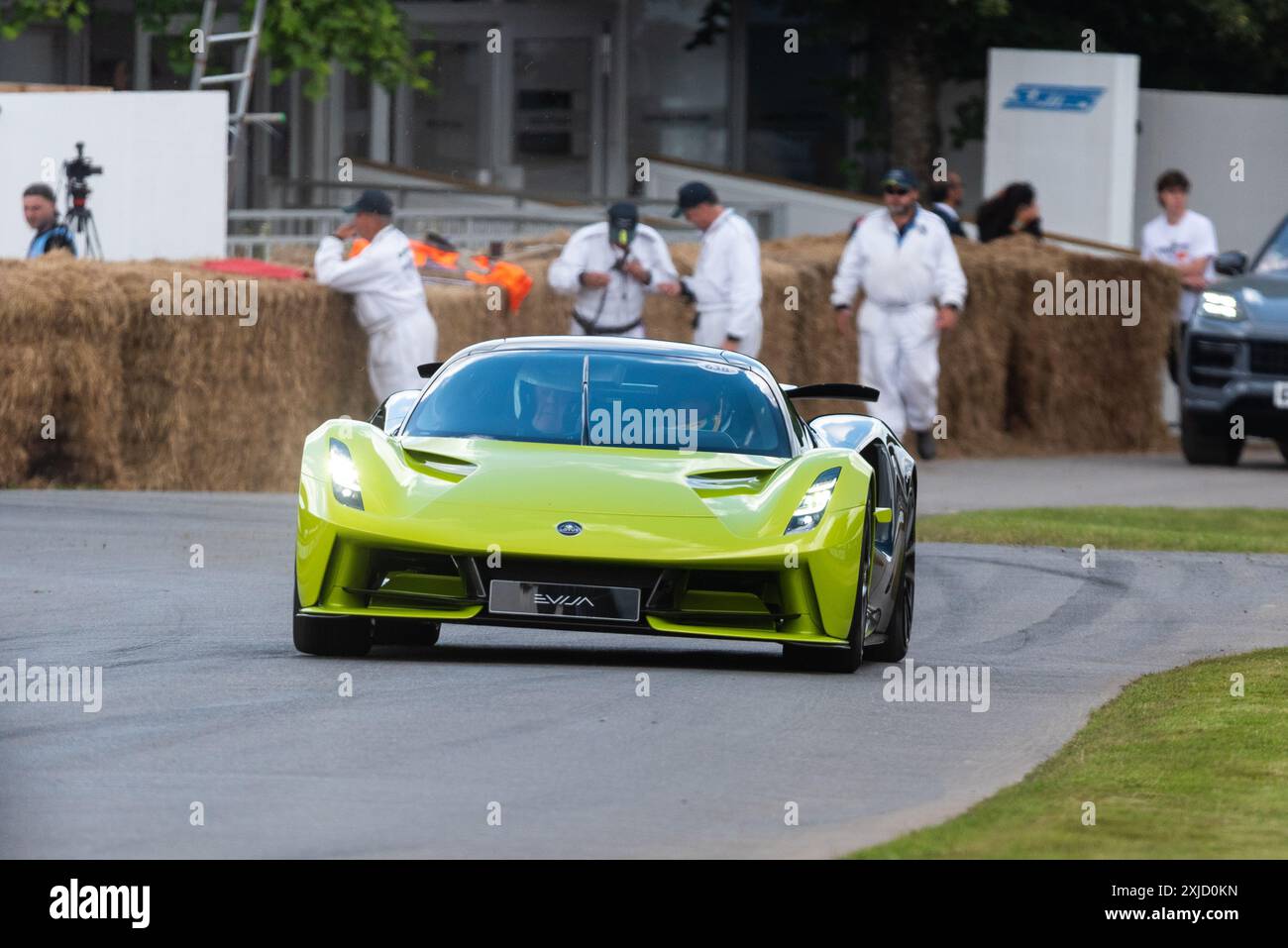 2023 Lotus Evija electric sports car driving up the hill climb track at ...