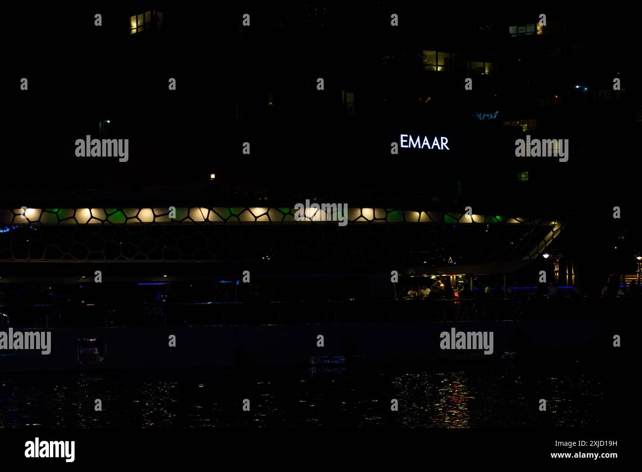 Emaar Real Estate company sign in neon light at night in Dubai City ...