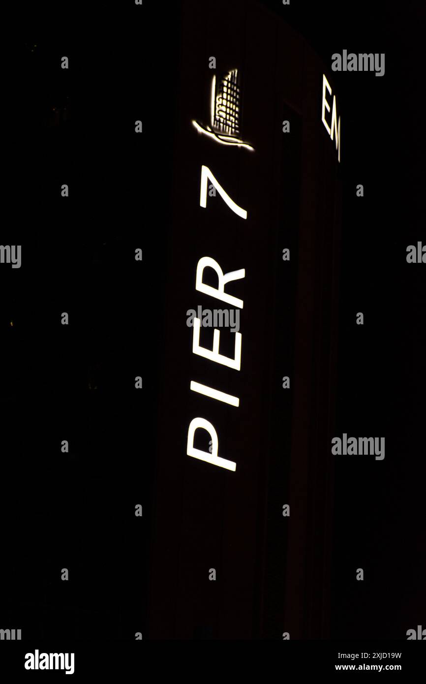 Pier 7 and Emaar Real Estate company signs in neon light at night in ...