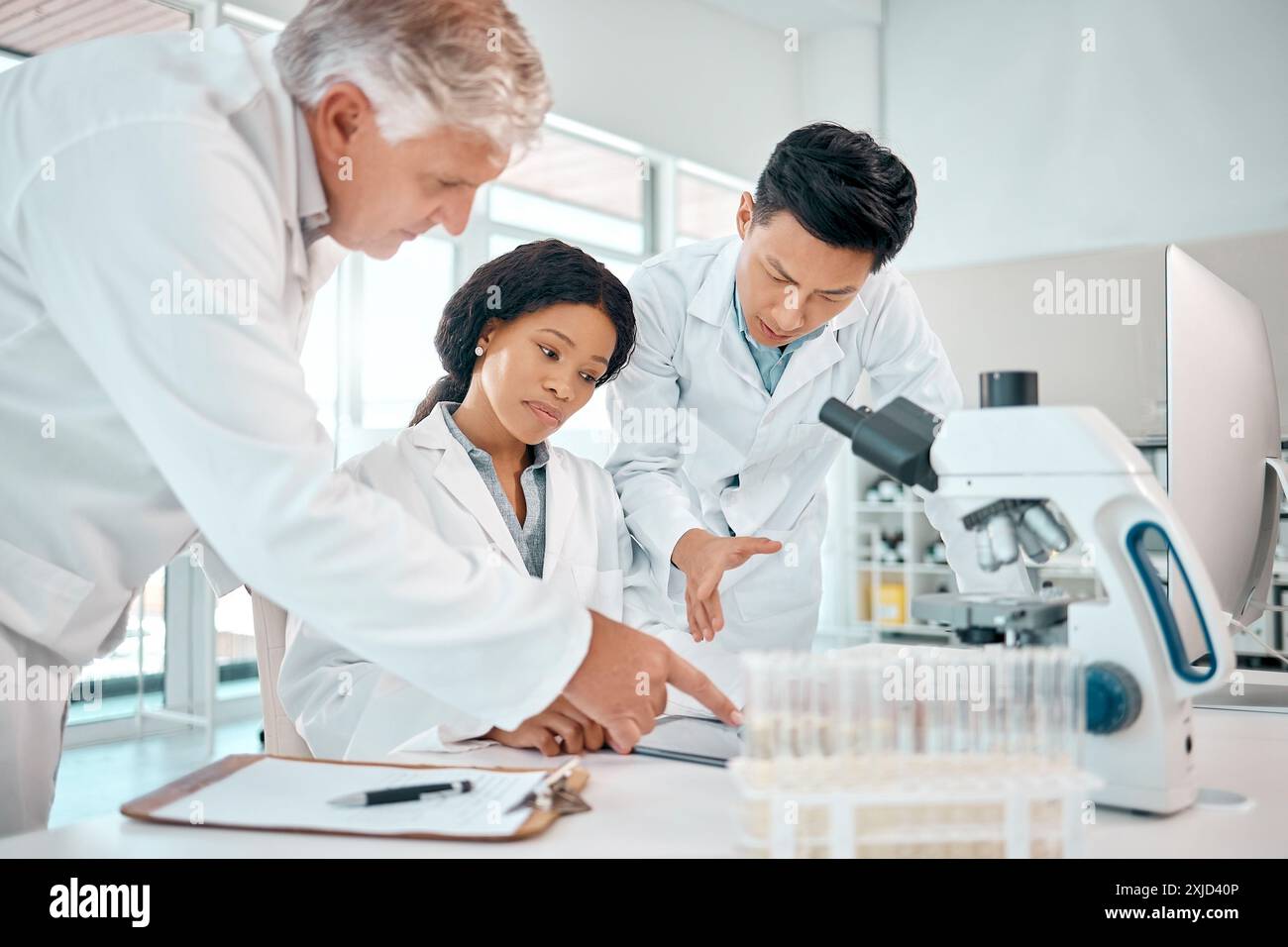 Research, science and teamwork with people in laboratory together for innovation or ...