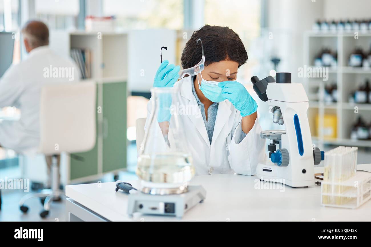 Microscope, science and woman with stress in lab for burnout, headache and overworked on DNA ...