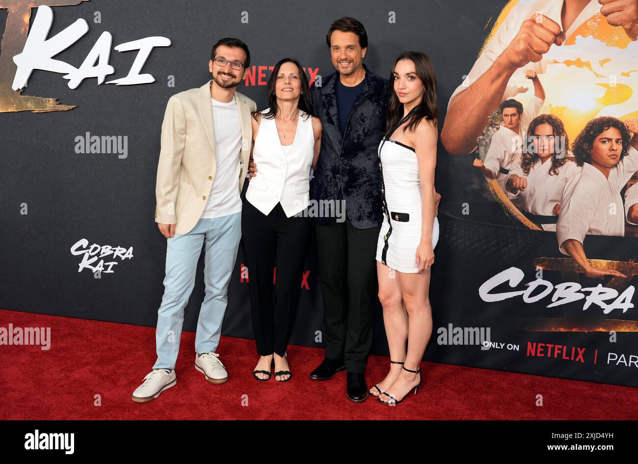 Ralph Macchio, second from right, poses with his wife Phyllis, second ...