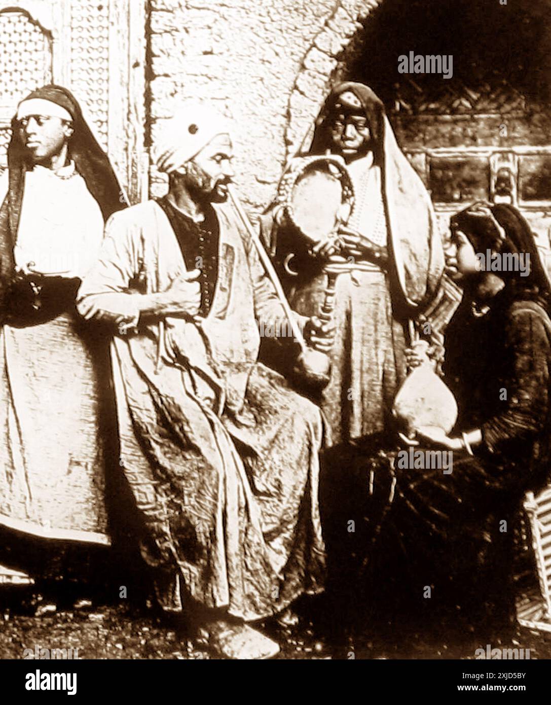 Arab family with a slave girl, Victorian period Stock Photo - Alamy