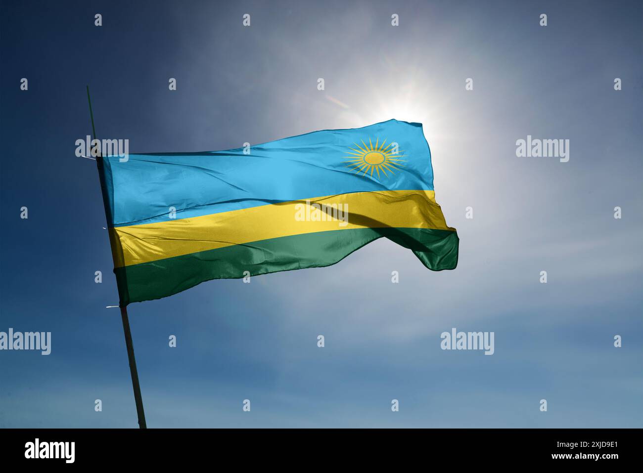 The flag of Rwanda The flag has three colours: blue, yellow, and green ...