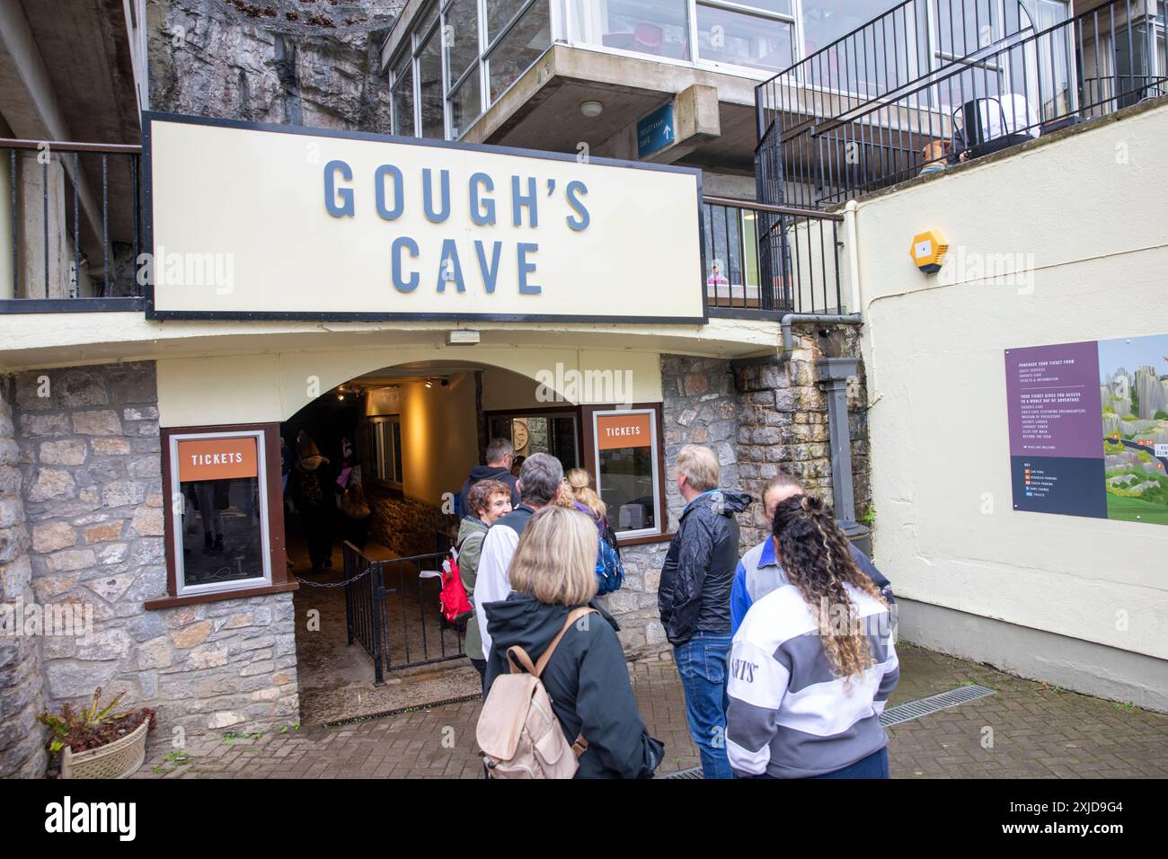 Cheddar gorge and caves, entrance to Goughs cave with visitors queueing ...