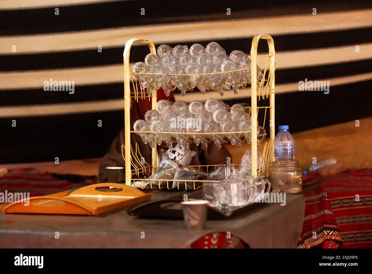 Many empty glasses for tea in Bedouin cafe, Jordan desert Stock Photo ...