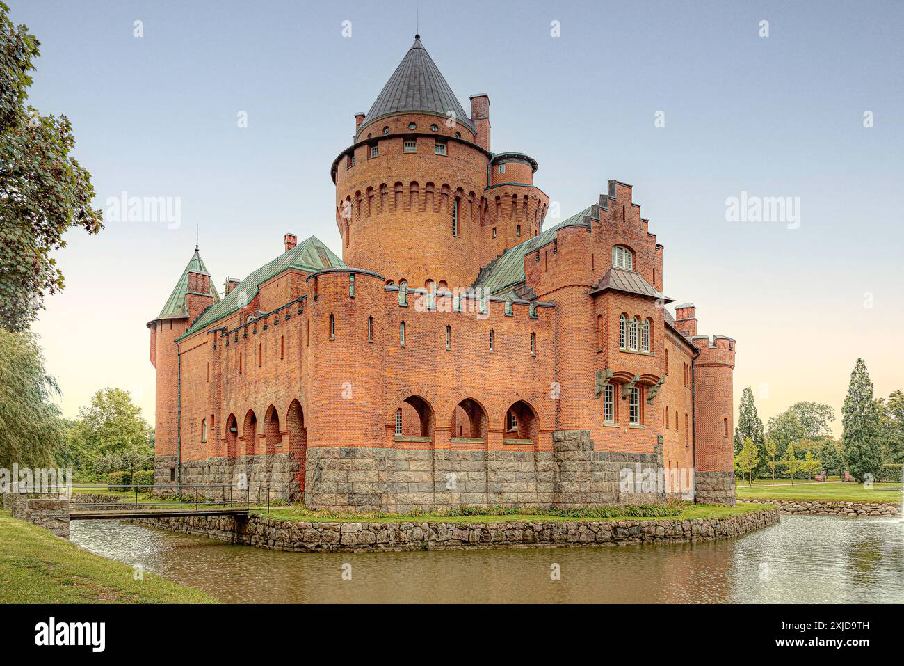 the romantic Hjularod fairy tale castle surrounded by a moat, Eslov, Sweden, September 16, 2021 ...