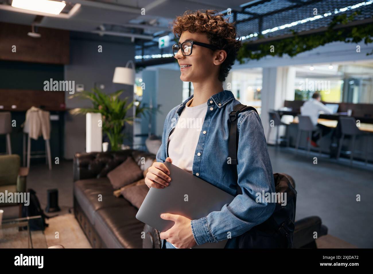 Office professional holding laptop hi-res stock photography and images ...