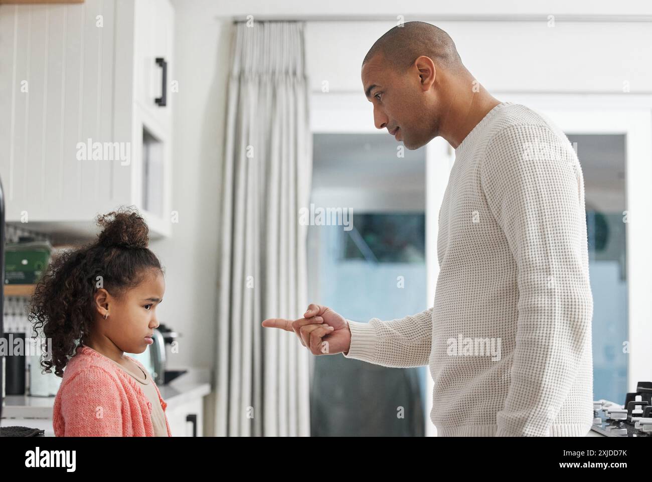 That behaviour is unacceptable. Dad, girl and home with pointing finger ...