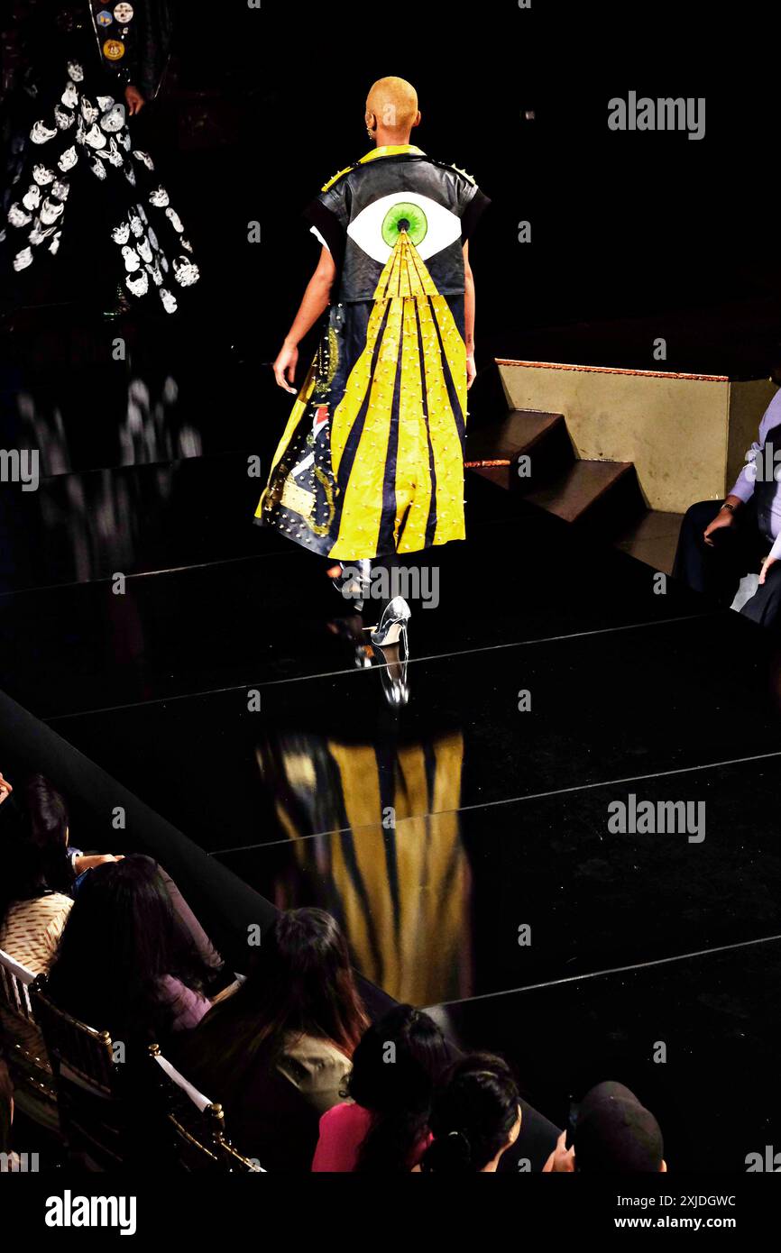 All seeing eye motif on the back of a long coat - Dexter Simmons (USA ...