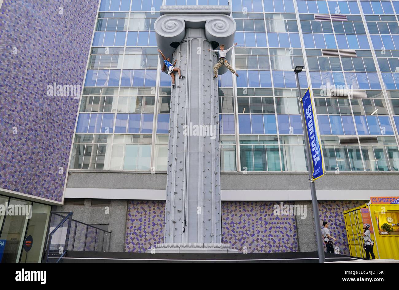 Members of the Gorp Girls climb a custom-built 10-metre climbing column ...
