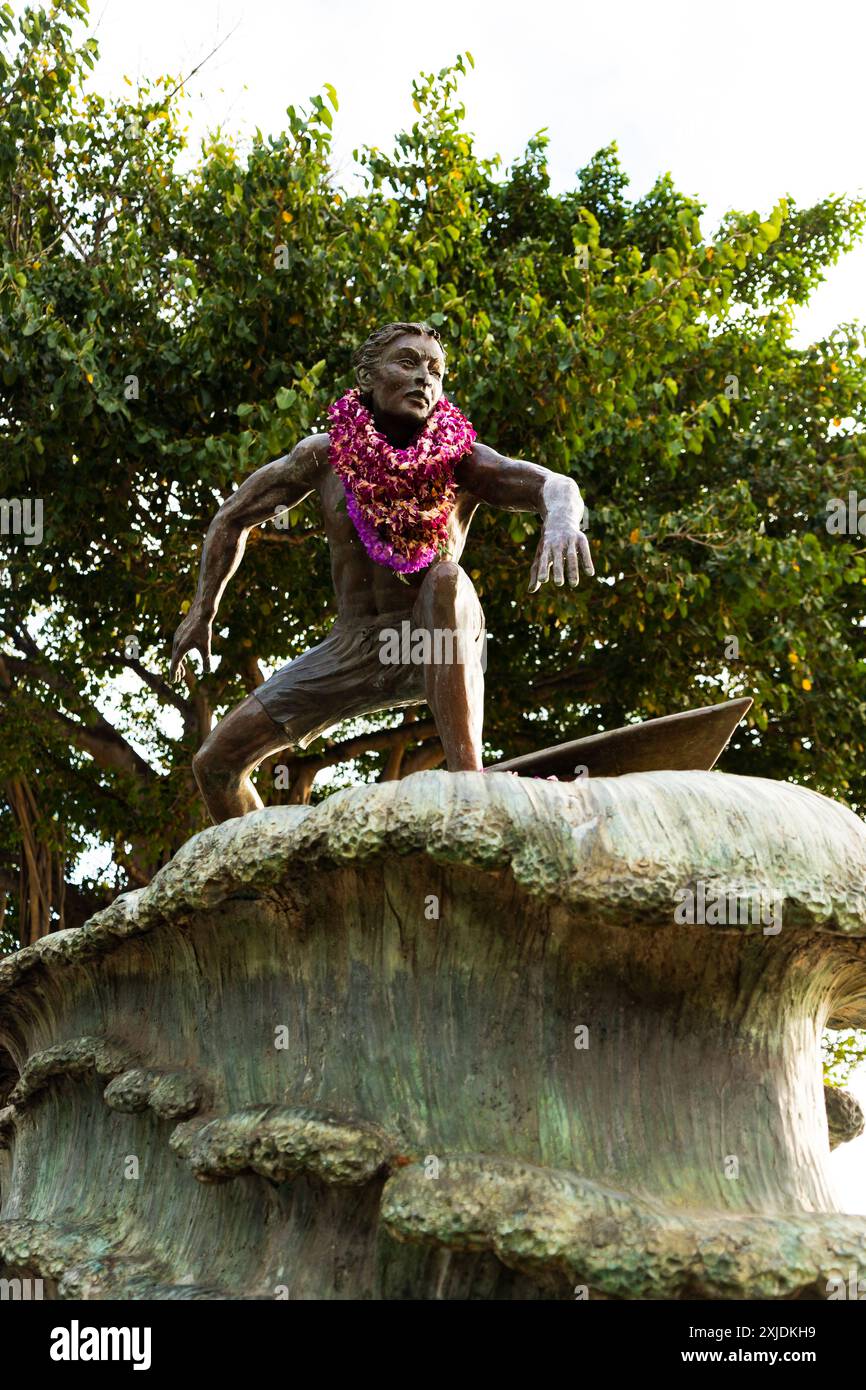 Surfing statue of a surfer riding a wave Stock Photo - Alamy