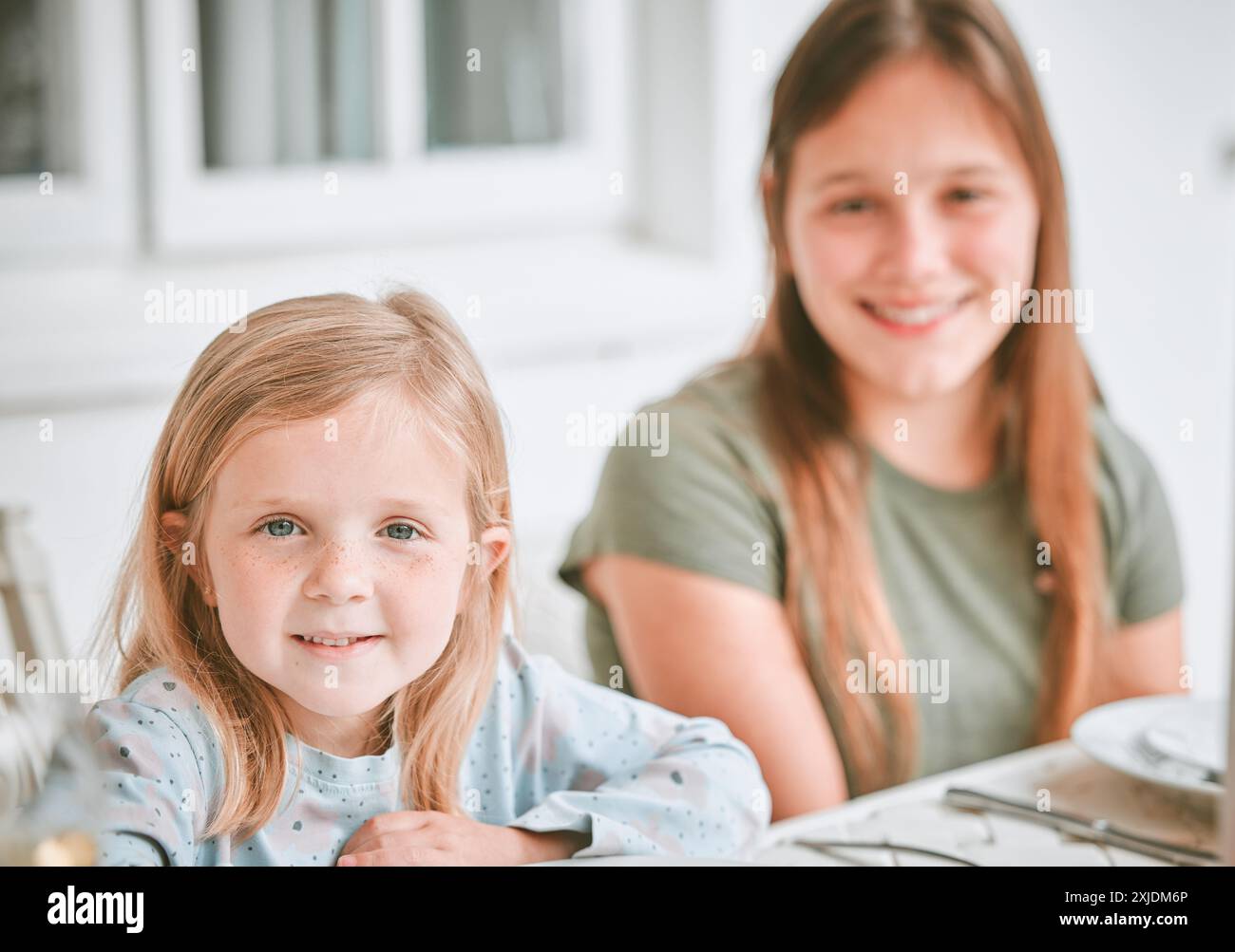 Happy, lunch and portrait of kids at table for meal, supper and dinner ...
